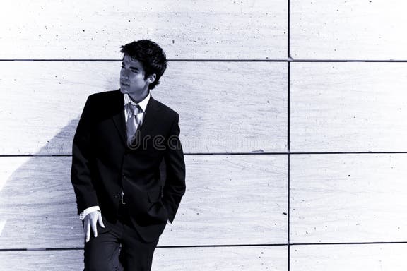 Businessman on wall stock image. Image of portrait, businessman - 5128525