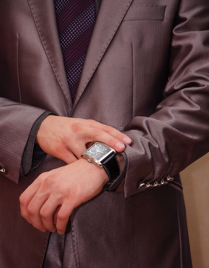 Businessman Watching His Clock Stock Photo - Image of people, male ...