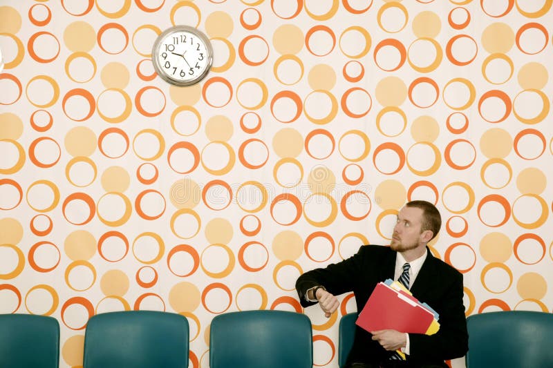 Businessman Watching the Time Stock Image - Image of dressed, colored ...