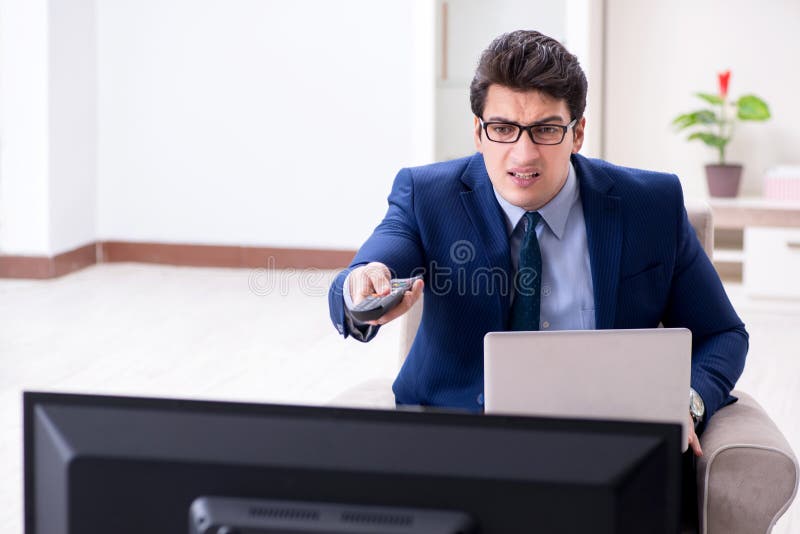 The Businessman Watching Tv in the Office Stock Image - Image of ...