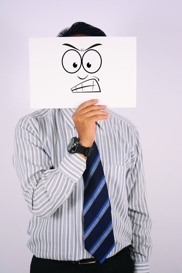 Businessman Wearing Angry Face Mask Stock Photo - Image of young ...