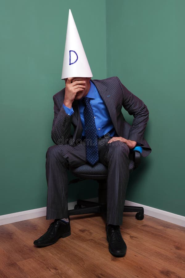 Businessman Wearing A Dunce Hat Stock Photos - Image: 9241483