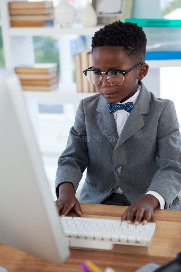 Businessman Wearing Eyeglasses while Using Computer Stock Image - Image ...