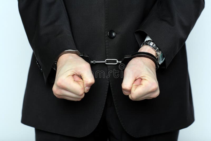 Businessman Wearing Handcuffs Stock Photo - Image of well, businessman ...