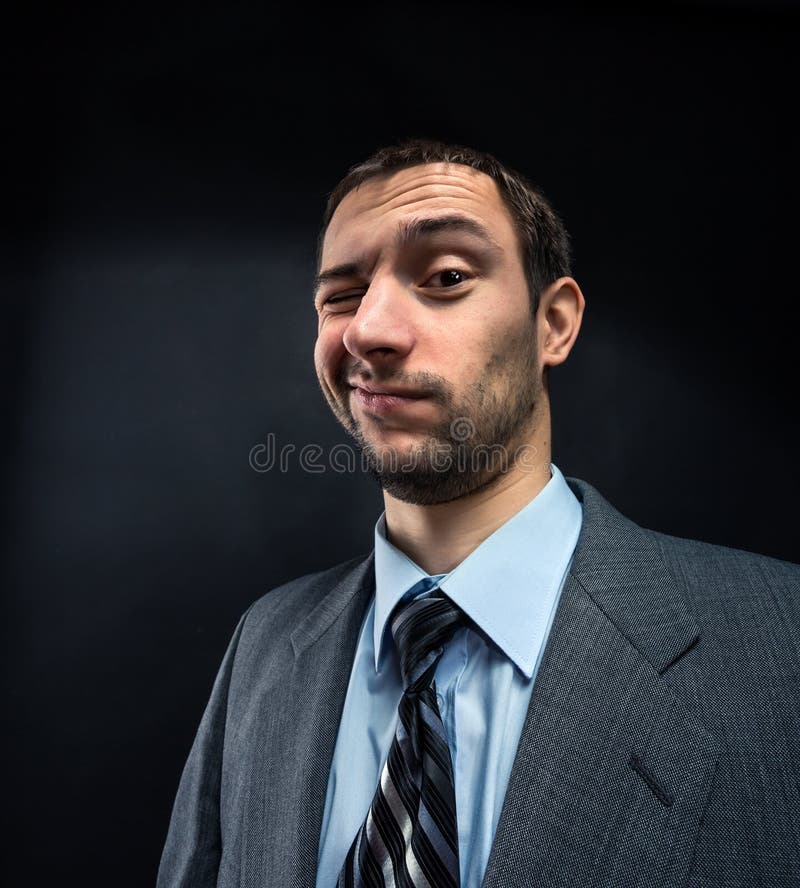 Businessman winking stock photo. Image of banker, excited - 66313044