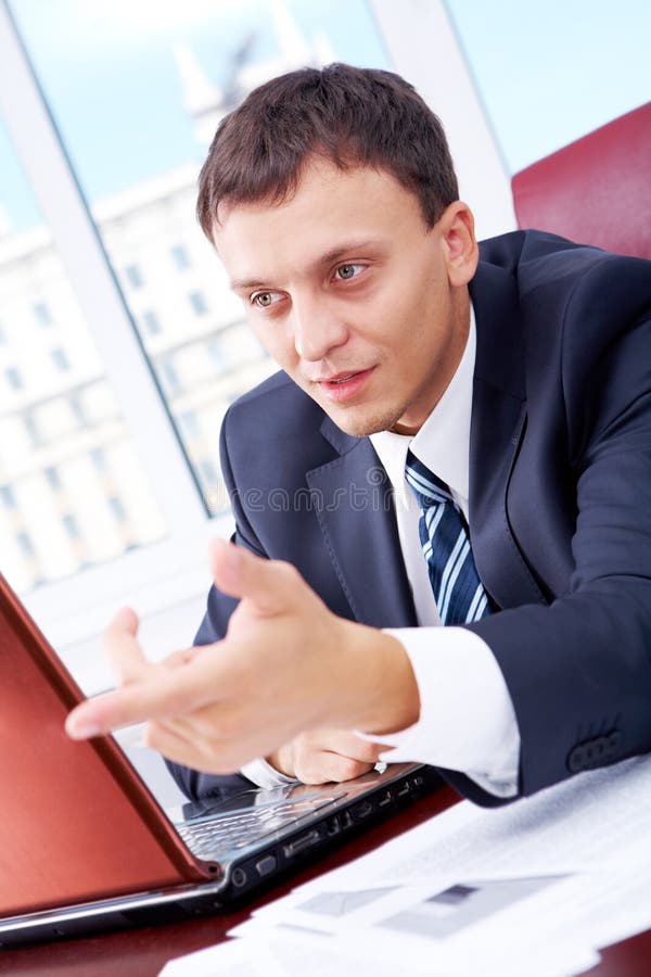 Confused Modern Business Man Sitting at Desk Stock Photo - Image of ...