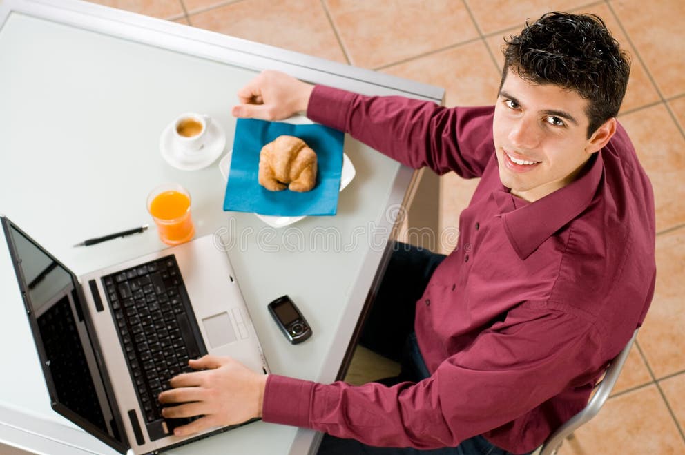 Businessman at Work with Breakfast Stock Photo - Image of computer ...