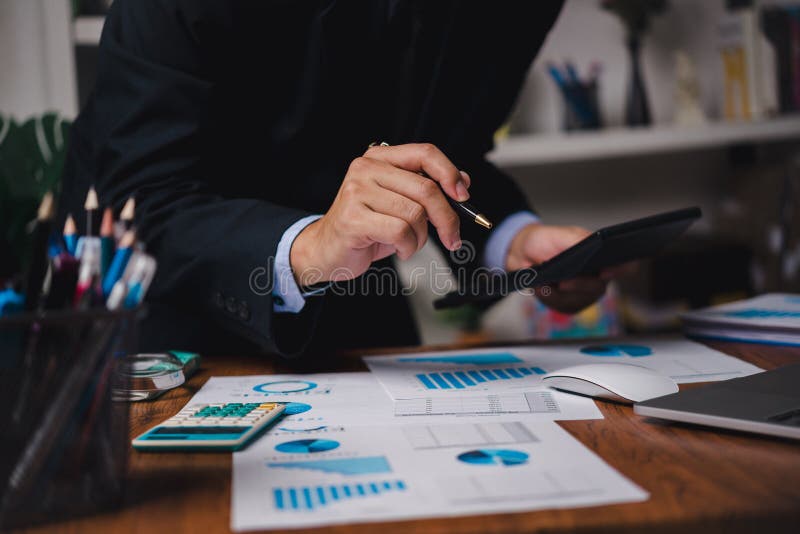 Businessman Working Accountant Document Graph and Chart on Desk Using ...