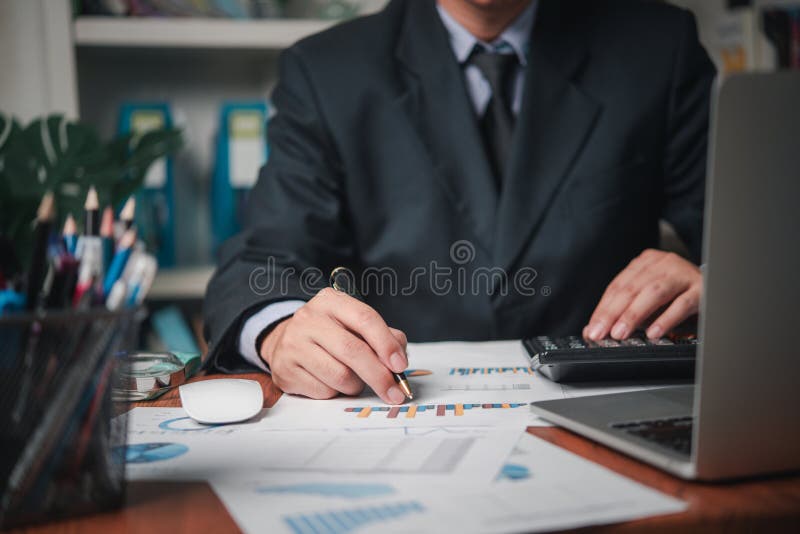 Businessman Working Accountant Document Graph and Chart on Desk Using ...