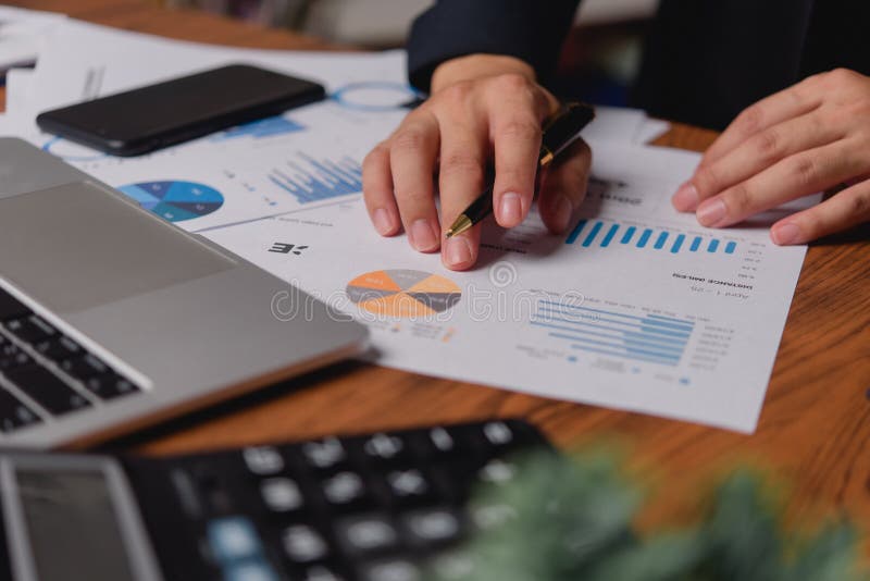 Businessman Working Accountant Document Graph and Chart on Desk Using ...