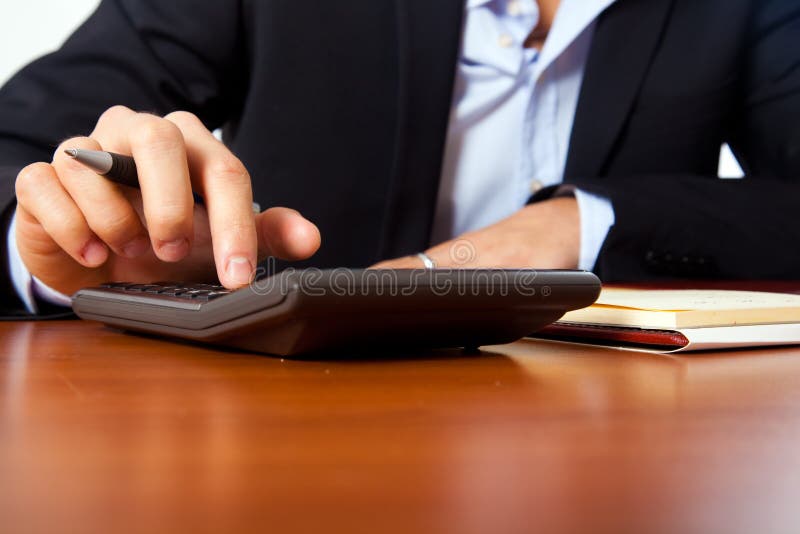 Businessman Working with Calculator Stock Image - Image of office ...
