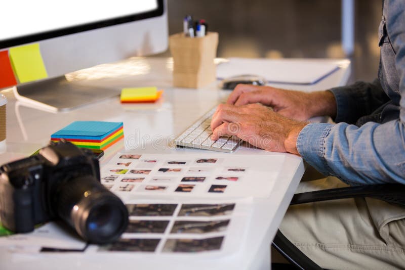 Businessman Working on Computer at Desk Stock Image - Image of ...