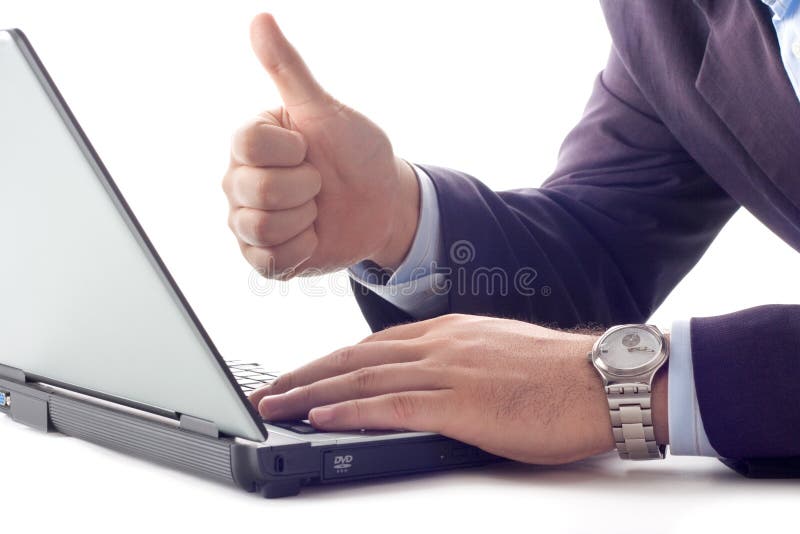 Businessman Working On A Computer With His Thumb Up Stock Image - Image ...