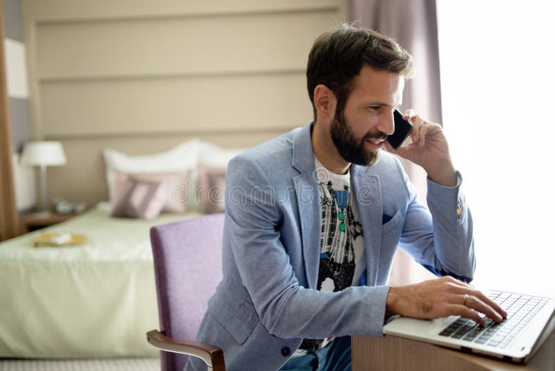 Businessman Working on Computer in Hotel Room Stock Image - Image of ...