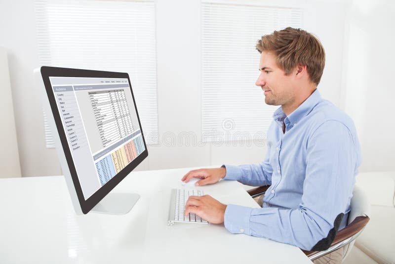 A Person Working at Office with Personal Computer Screen that Have a ...