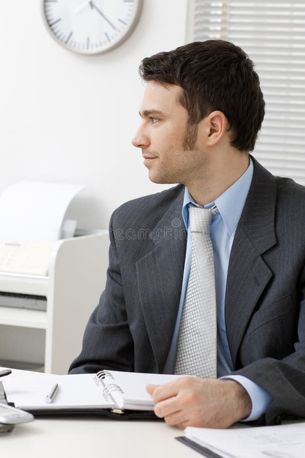 Businessman Working at Desk Stock Photo - Image of casual ...