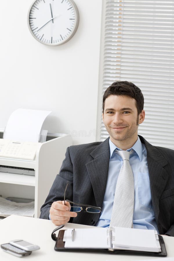 Businessman Working at Desk Stock Photo - Image of cheerful ...