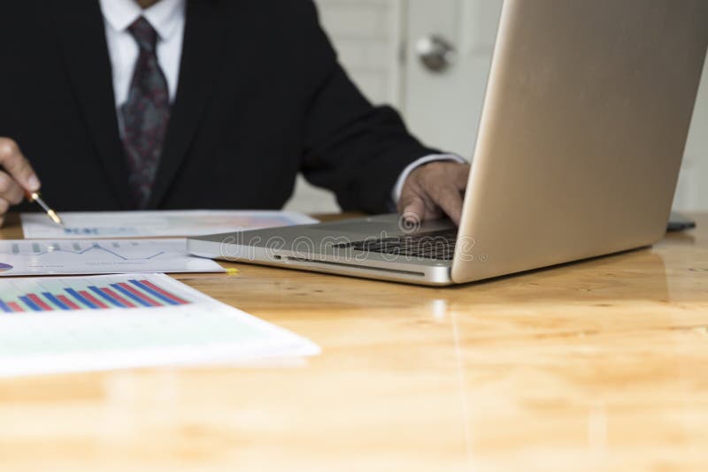 Businessman Working with Diagram Paperwork Document, Laptop Comp Stock ...