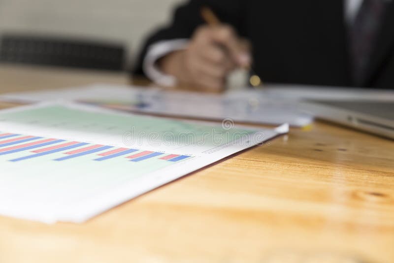 Businessman Working with Diagram Paperwork Document, Laptop Comp Stock ...