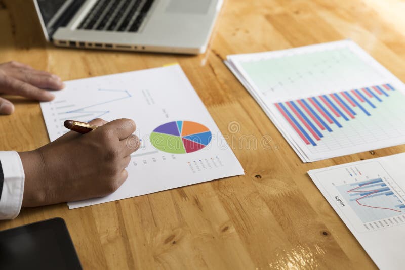 Businessman Working with Diagram Paperwork Document, Tablet, Lap Stock ...