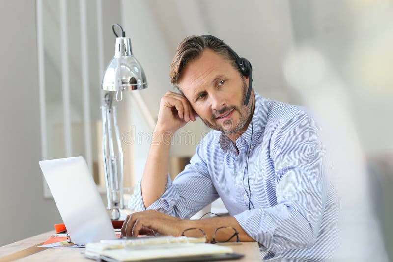Man Working with Headset on Stock Image - Image of adult, distant: 37048377