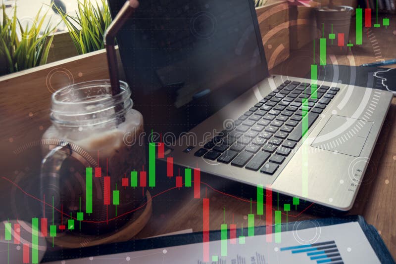 Businessman is Working with His Computer in Coffee Shop with Stock ...