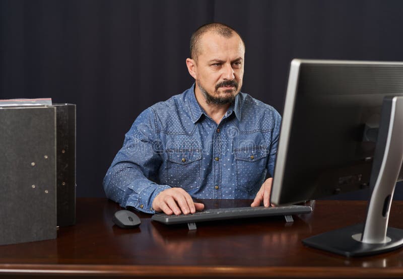 Businessman Working at His Computer Stock Photo - Image of online ...