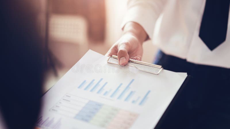 Businessman Working at His Office with Documents and Check the Accuracy ...