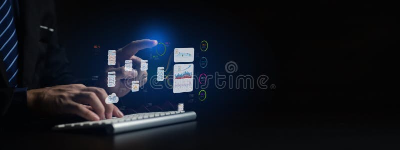 Businessman Working with Holograms Showing Business Graphs and Various ...