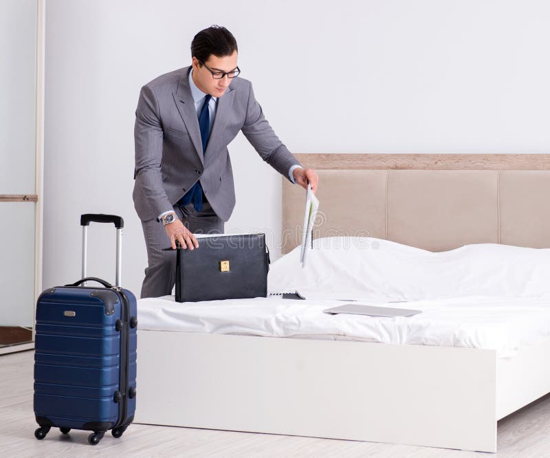 Businessman Working in Hotel Room Stock Image - Image of bedding ...