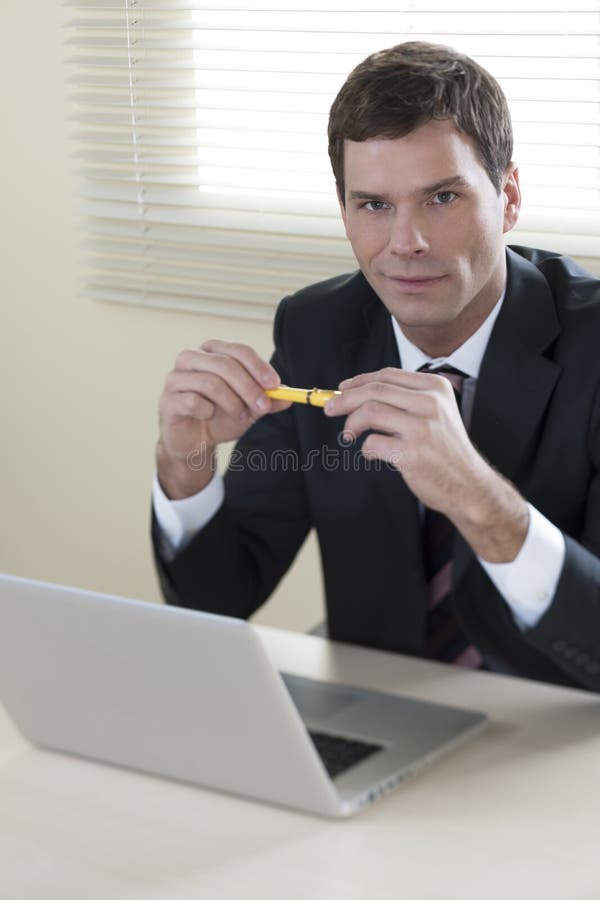 Businessman Working on Laptop Stock Photo - Image of global, looking ...