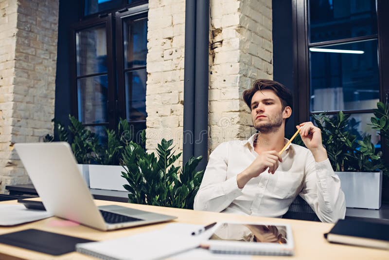 Businessman Working on Laptop in Office Stock Photo - Image of ...