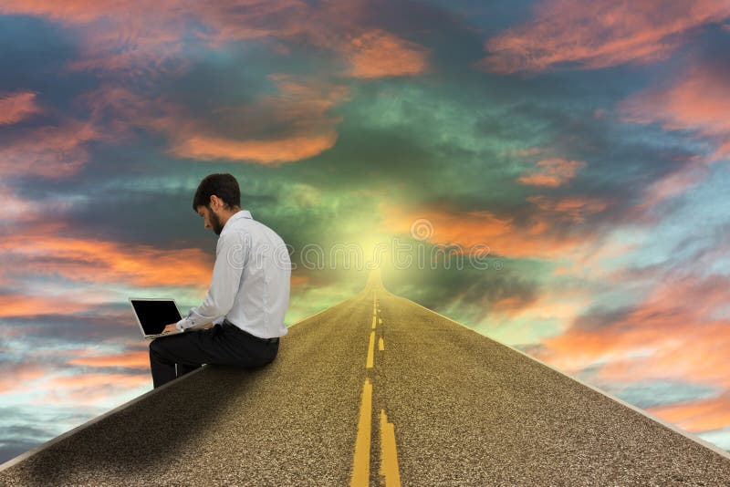 Businessman Working with Laptop on Roadside at Sunset Stock Photo ...