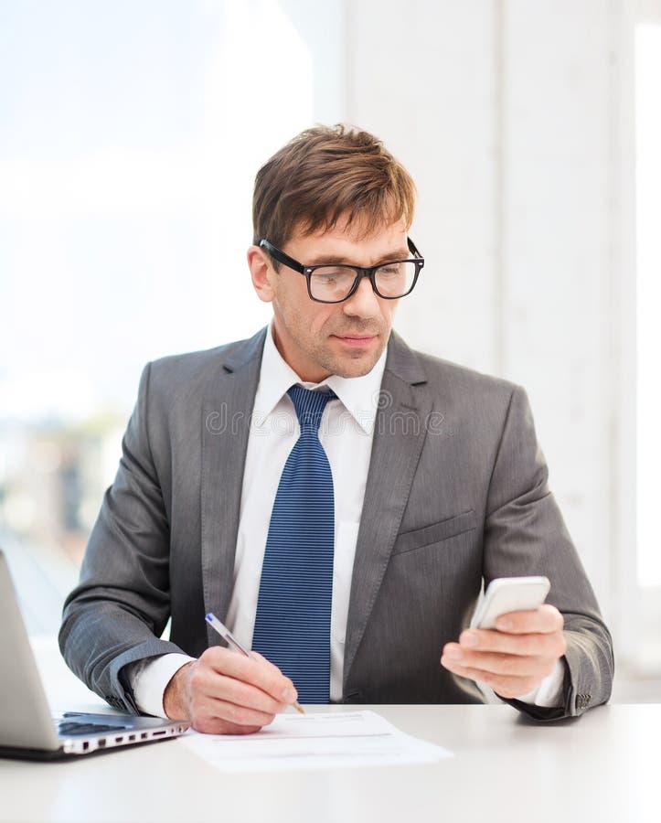 Businessman Working with Laptop and Smartphone Stock Image - Image of ...