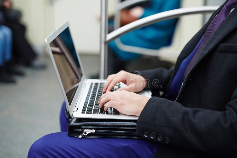 Businessman Working with Laptop in Subway Stock Photo - Image of ...