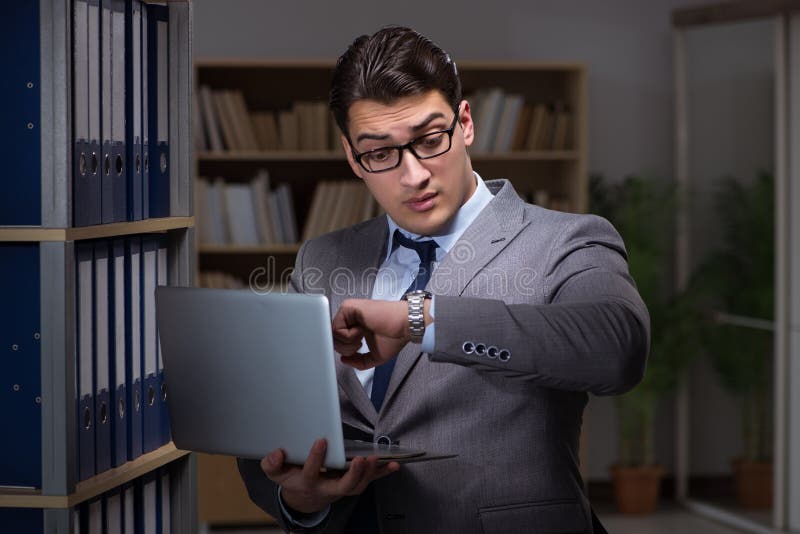 The Businessman Working Late Hours in the Office Stock Photo - Image of ...