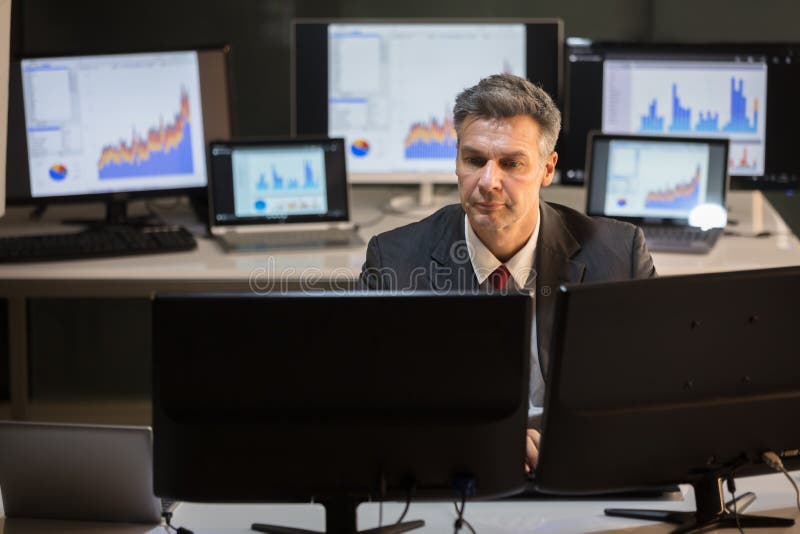 Businessman Video Conferencing with Colleagues on Computer Stock Image ...