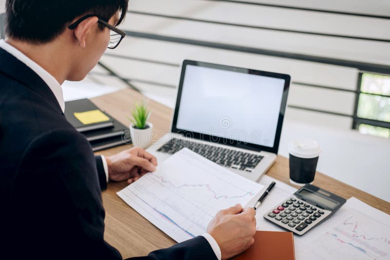 Businessman Working New Project on Laptop Computer with Report Document ...