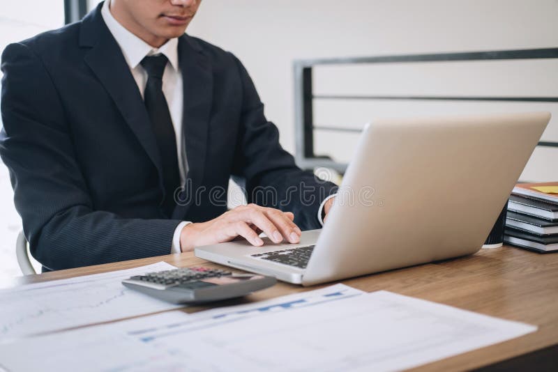 Businessman Working New Project on Laptop Computer with Report Document ...