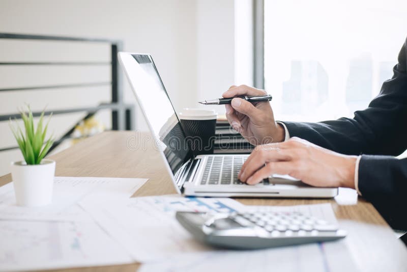 Businessman Working New Project on Laptop Computer with Report Document ...