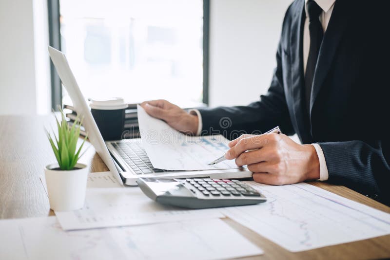 Businessman Working New Project on Laptop Computer with Report Document ...