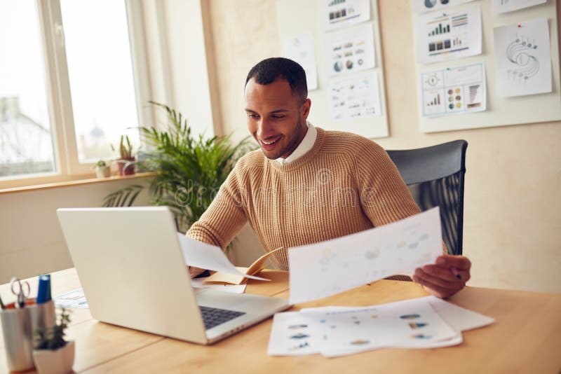 Businessman Working in Office. Positive Guy Examining Documents Stock ...
