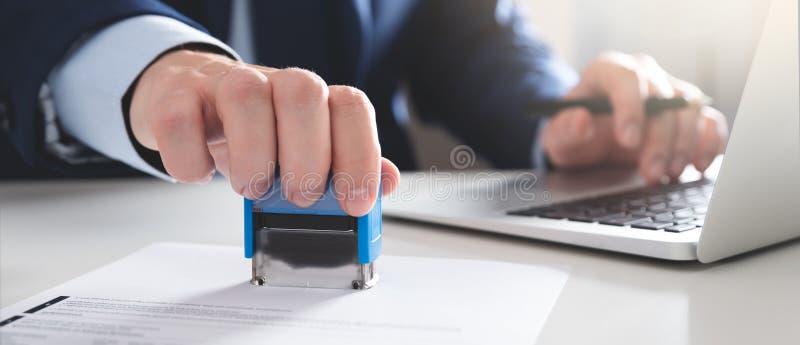 Businessman Working in Office with Stamp Stock Photo - Image of paper ...
