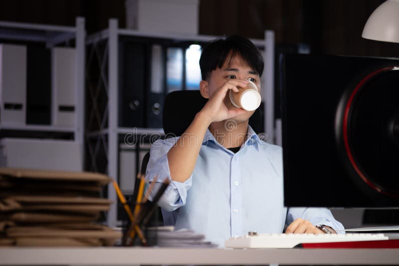 Businessman Working Overtime at His Office he Felt Tired. Stock Photo ...