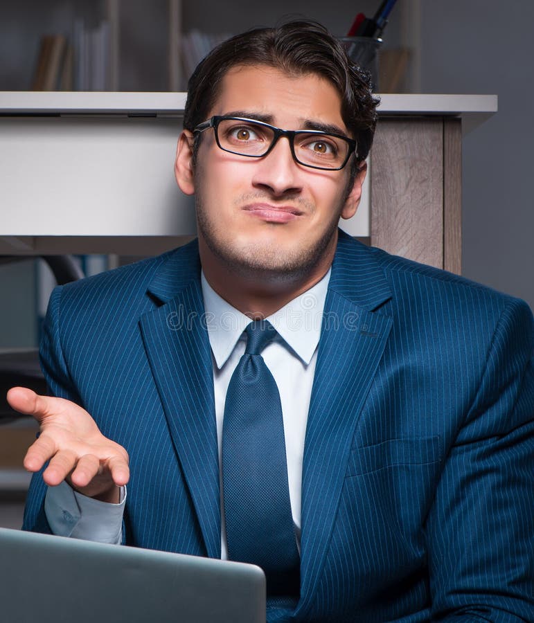 Businessman Working Overtime Long Hours Late in Office Stock Photo ...