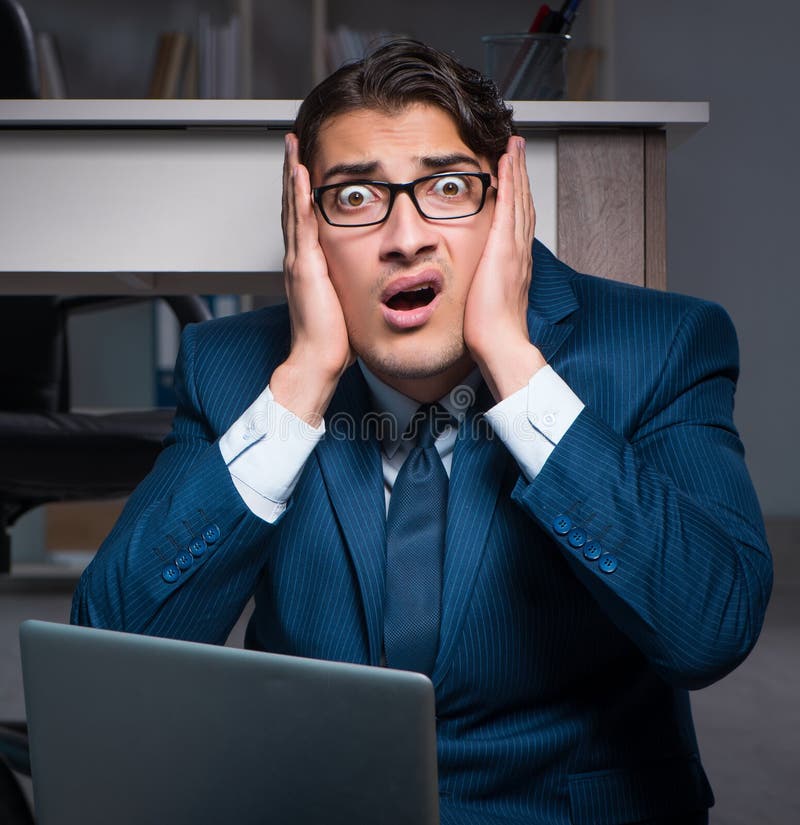 Businessman Working Overtime Long Hours Late in Office Stock Photo ...