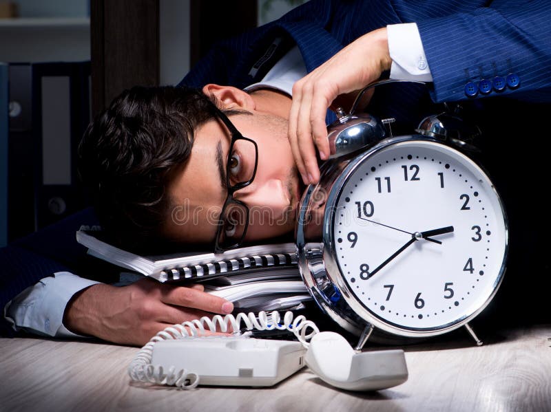Businessman Working Overtime Long Hours Late in Office Stock Image ... Businessman Working Overtime Long Hours Late in Office Stock Image ...