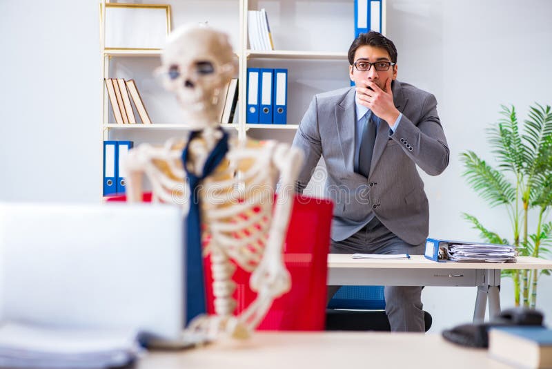 The Businessman Working with Skeleton in Office Stock Photo - Image of ...