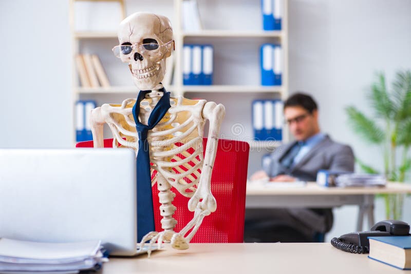 The Businessman Working with Skeleton in Office Stock Photo - Image of ...
