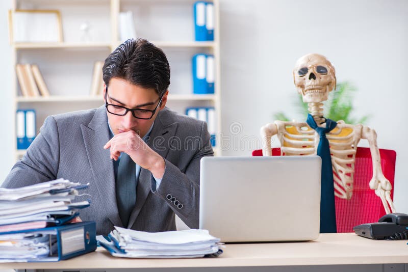 The Businessman Working with Skeleton in Office Stock Image - Image of ...